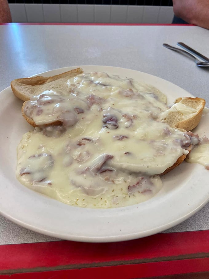 Cream chipped beef that doesn't just cover the toast – it transforms it into a savory island in a sea of creamy, meaty goodness.