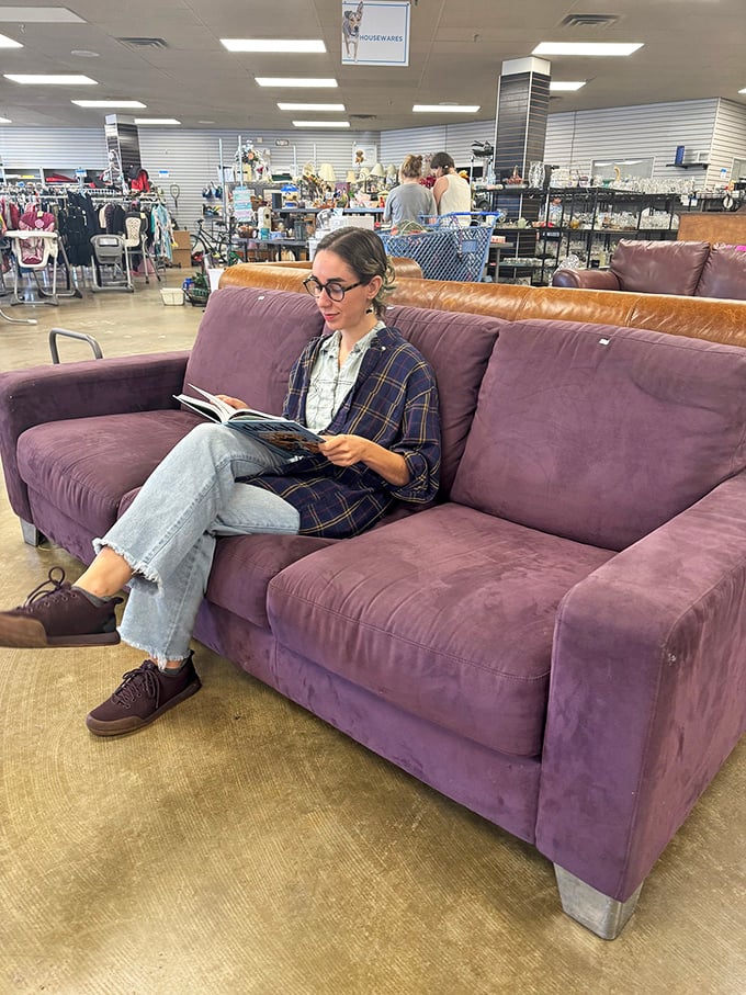 Test-driving comfort is essential—this plush purple sofa might just follow someone home after a successful shopping expedition.