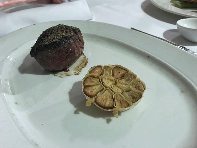This filet mignon isn't just cooked—it's been mentored to perfection, with a sear that would make steakhouse veterans weep with joy.