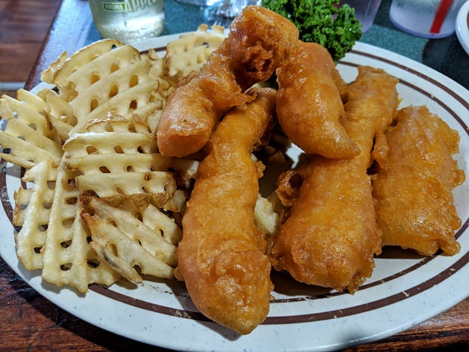 These golden-battered fish fillets and waffle fries aren't just food—they're edible sunshine. The kind of plate that makes you want to high-five the chef.