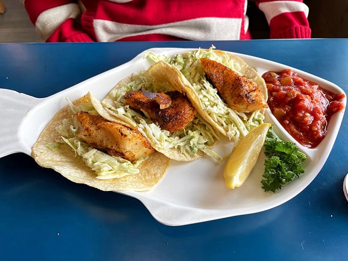 These fish tacos aren't just a meal; they're a vacation on a plate. Crispy fish, fresh cabbage, and a squeeze of lemon—simple perfection that tastes like sunshine.
