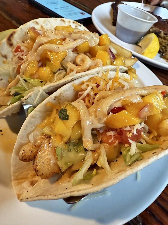 Fish tacos that bring the tropics to the Chesapeake – mango salsa and tender white fish create a vacation on a plate.