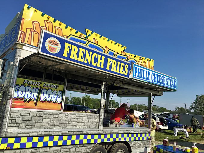 The universal language of fair food speaks volumes here—foot-long corn dogs and Philly cheesesteaks fuel serious shopping expeditions.