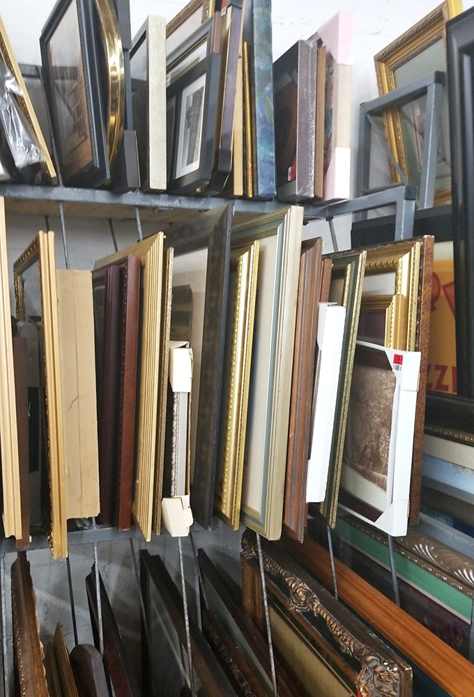 A gallery of empty frames – each one a window of possibility for your forgotten photos or newly discovered vintage art prints.