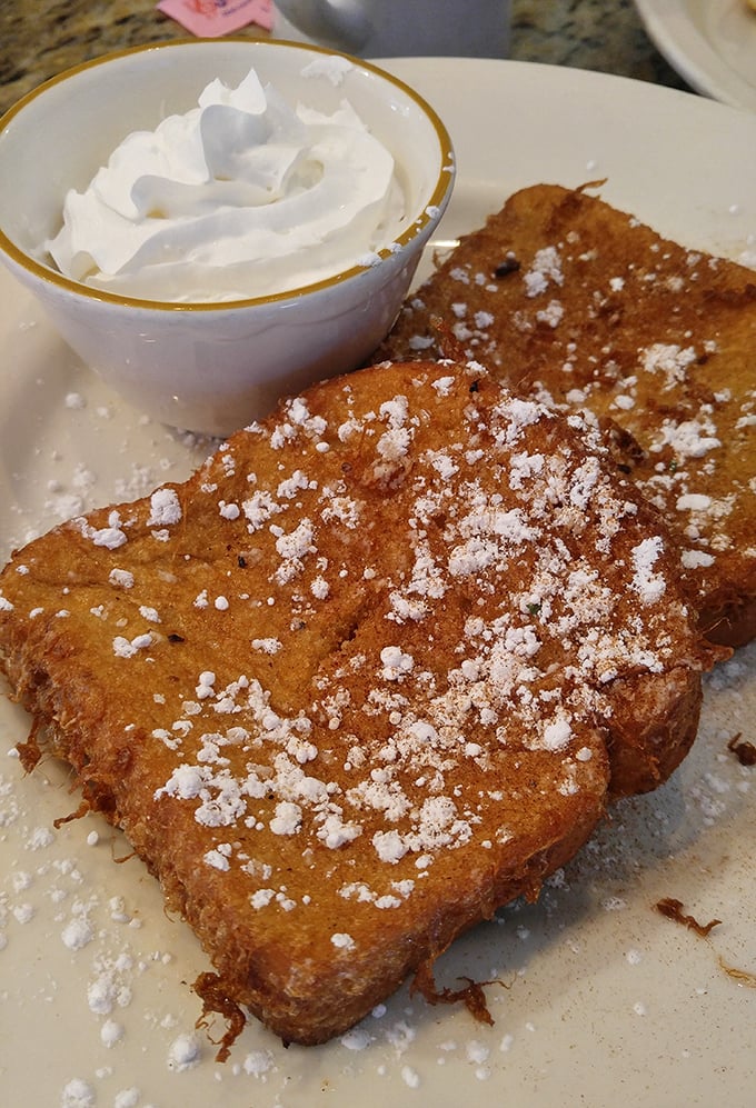Their deep-fried French toast dusted with powdered sugar isn't just breakfast—it's what angels eat when nobody's looking.