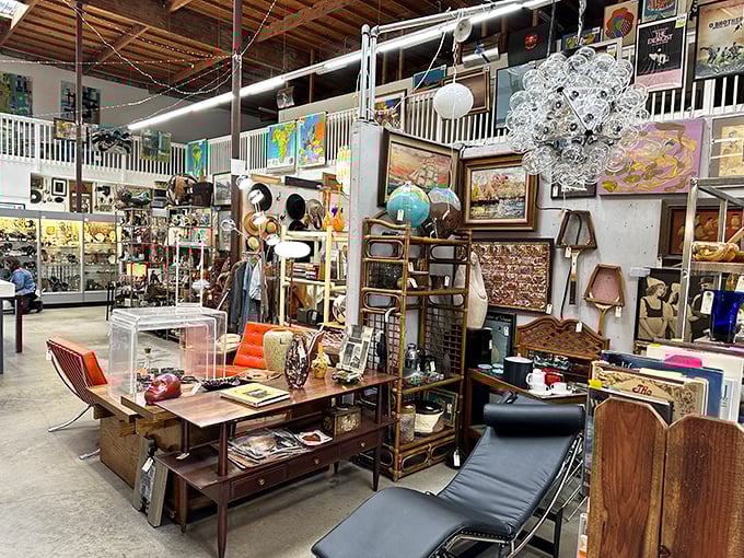 Mid-century modern meets eclectic collector's paradise in this corner where furniture isn't just functional—it's a time machine with cushions.