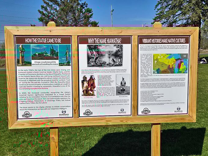 Knowledge is power at this informational display, answering the burning questions every visitor has: "Why is he here?" and "Why is he so enormously tall?"