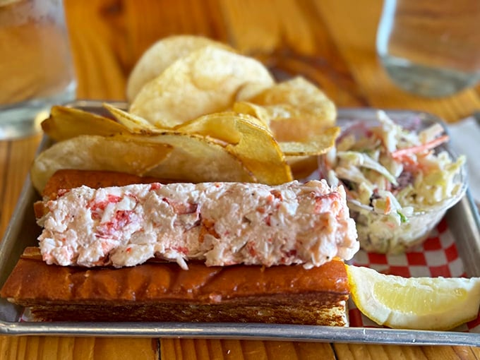 Not all heroes wear capes – some come on buttered rolls. This lobster roll doesn't just satisfy hunger; it resolves existential crises.
