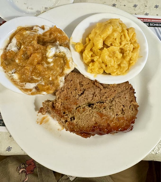 Meatloaf, mashed potatoes, and mac & cheese – the holy trinity of comfort food that makes you want to hug the chef.