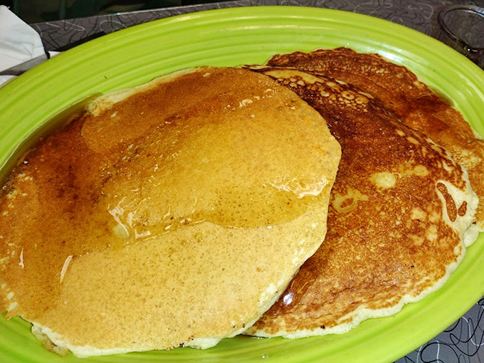 These pancakes don't just sit on the plate—they command it. Golden-brown, fluffy, and practically begging for maple syrup.