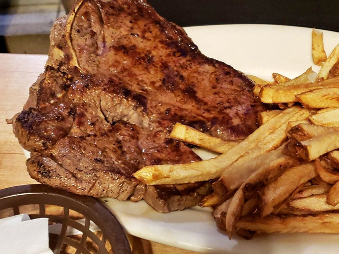 This isn't just a steak; it's a declaration of independence from mediocre meals. Those hand-cut fries aren't sidekicks—they're co-stars.