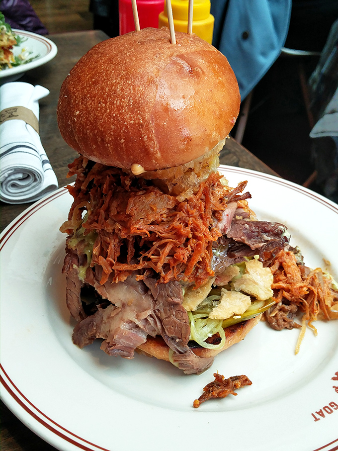 This sandwich isn't just stacked—it's practically architectural, with layers of tender meat creating a savory skyscraper worthy of the Chicago skyline.