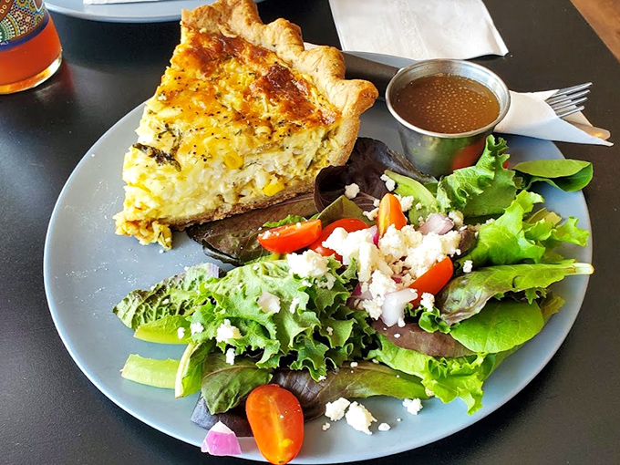 This quiche doesn't play games – it's serious about flavor, with a side salad that didn't come from a bag. Your grandmother would approve.