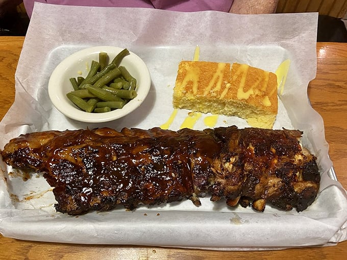 Ribs that don't need a resume – that smoke ring and glistening sauce tell you everything about their low-and-slow pedigree.