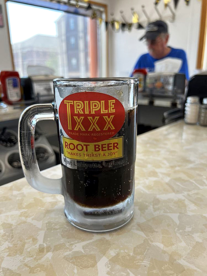 If root beer were royalty, Triple XXX would be wearing the crown. This frosty mug isn't just a drink—it's a Midwest tradition in liquid form.