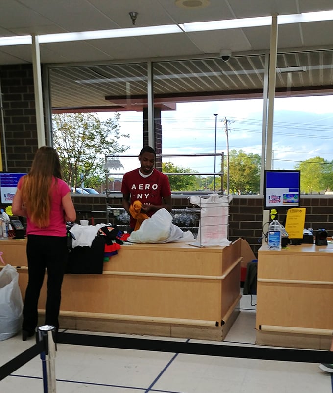 The checkout experience: where friendly staff help transform your pile of possibilities into a bag of bargains worth bragging about.
