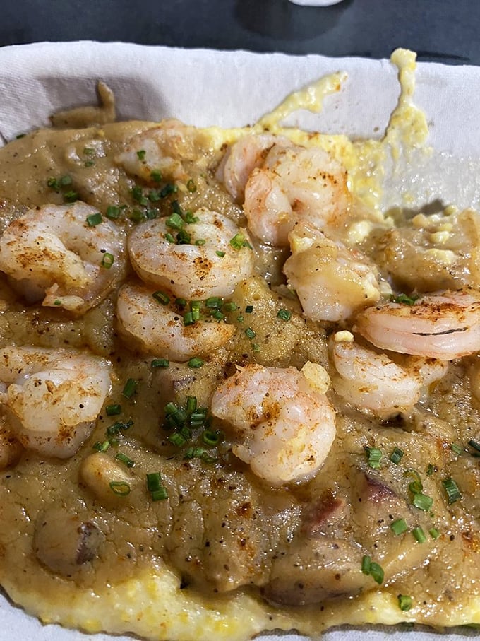 Shrimp and grits that would make your Southern grandmother weep with joy—creamy, cheesy perfection topped with perfectly seasoned crustaceans.