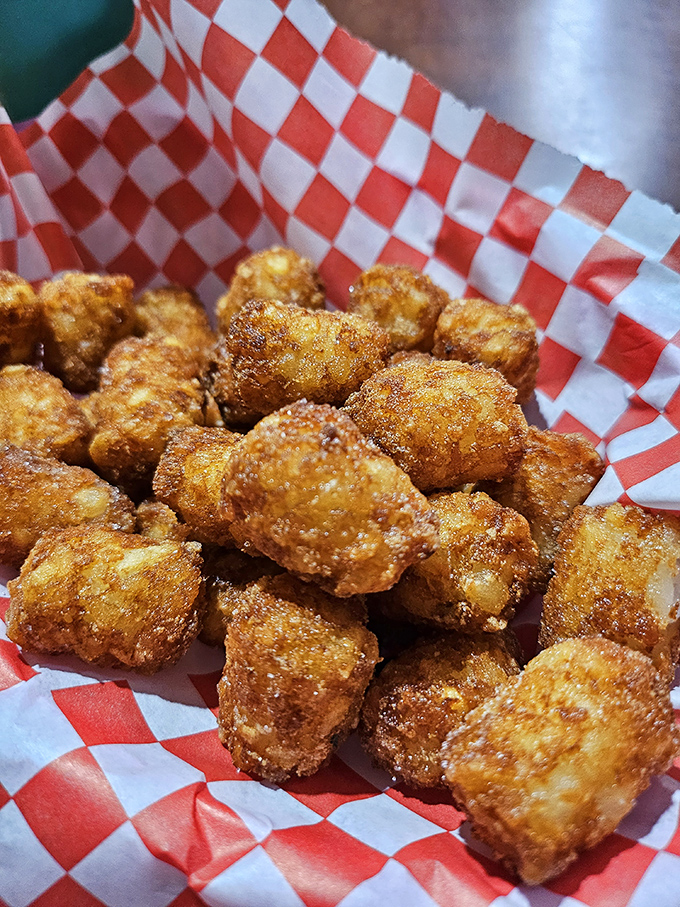 Golden-brown tater tots that crunch like autumn leaves – these crispy nuggets of potato perfection could make a grown person weep with joy.