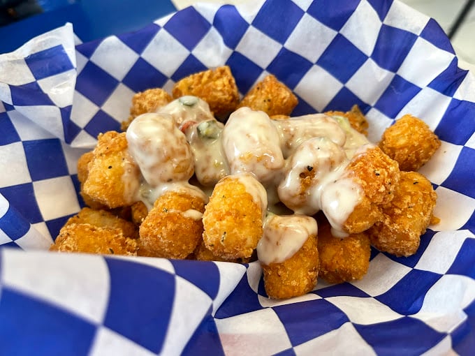 These aren't your childhood tater tots—they're what your childhood tots dreamed of becoming when they grew up. Crispy outside, fluffy inside, heavenly all over.
