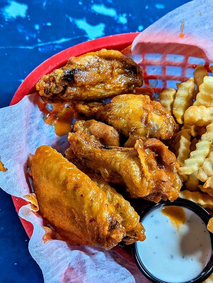 Wings that don't need a sports bar to shine. Crispy, saucy, and unapologetically messy—exactly how comfort food should introduce itself to your taste buds.