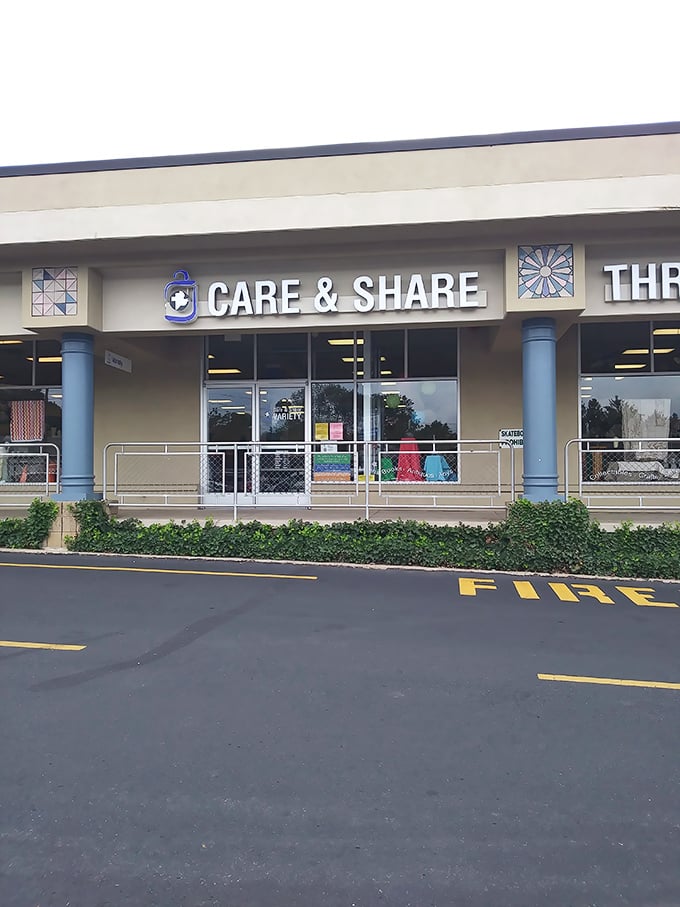 Care & Share's welcoming storefront features charming blue columns and accessibility ramps. Everyone deserves the joy of finding the perfect thrift treasure.