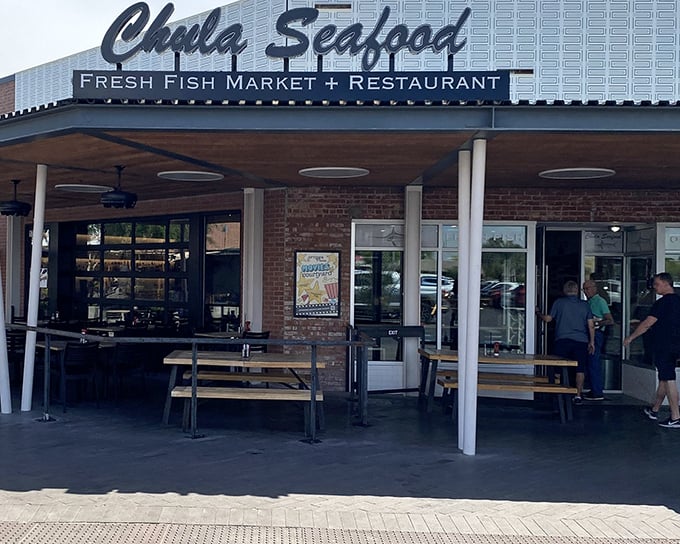 Chula Seafood's modern simplicity speaks volumes. Clean lines, brick accents, and outdoor seating—the perfect stage for ocean-fresh stars.