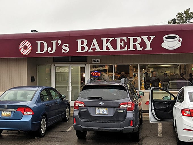 DJ's Bakery proves that sometimes the best treasures hide in plain sight – that red awning is basically a superhero cape for donut lovers.