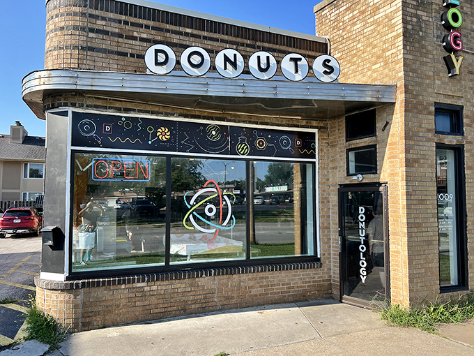 Science meets sweetness! Donutology's atomic logo hints at the experimental delights waiting inside this Kansas City laboratory of flavor.