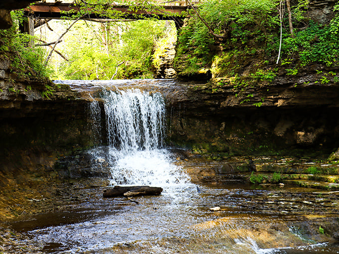 Glen Helen: Ancient rock walls cradle this woodland pathway, inviting explorers to discover what lies around the mossy bend ahead.