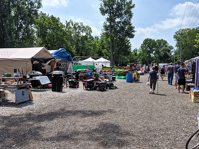 Gravel pathways and treasure-filled tents—Greenlawn Grove offers that perfect summer flea market experience we all crave.