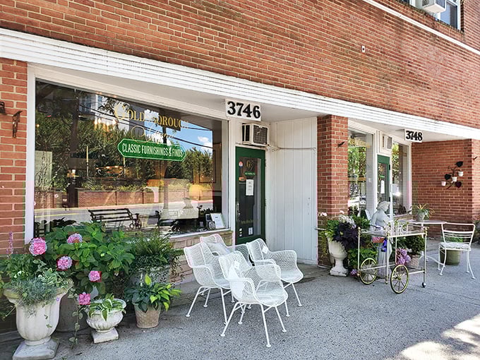 Kensington Antique Row welcomes you with its brick charm and blue awning. The gateway to a street full of historical treasures!