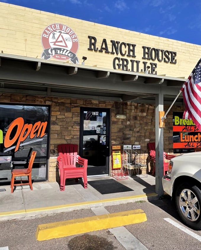 Those red chairs aren't just for sitting – they're where you'll need to recover after tackling Ranch House Grille's legendary country breakfast.