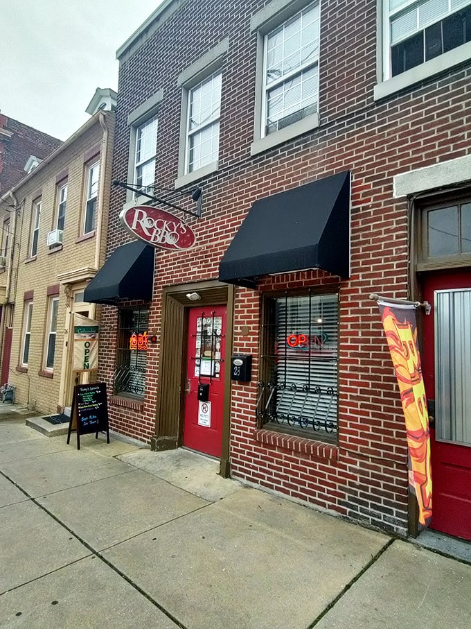 Behind that bright red door lies a brick-front BBQ sanctuary that proves size definitely doesn't matter.