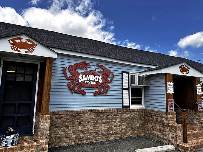 Sambo's blue exterior with those giant crab signs tells you everything—this place means serious crustacean business.