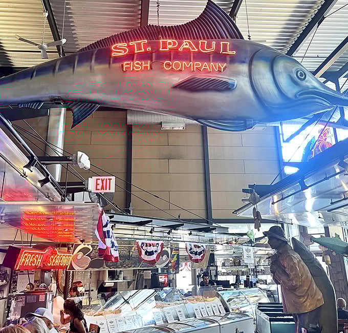 That's not just decoration—it's inspiration! Beneath this magnificent marlin lies a seafood market that would make Neptune jealous.