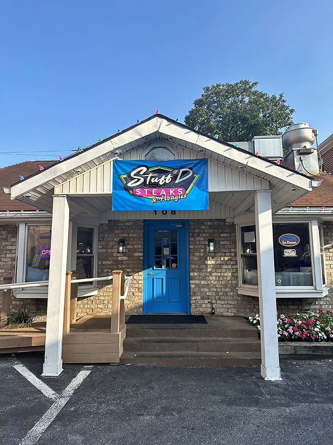 That bright blue door is your portal to cheesesteak heaven. Stuff'D's stone cottage exterior hides sandwich treasures within.