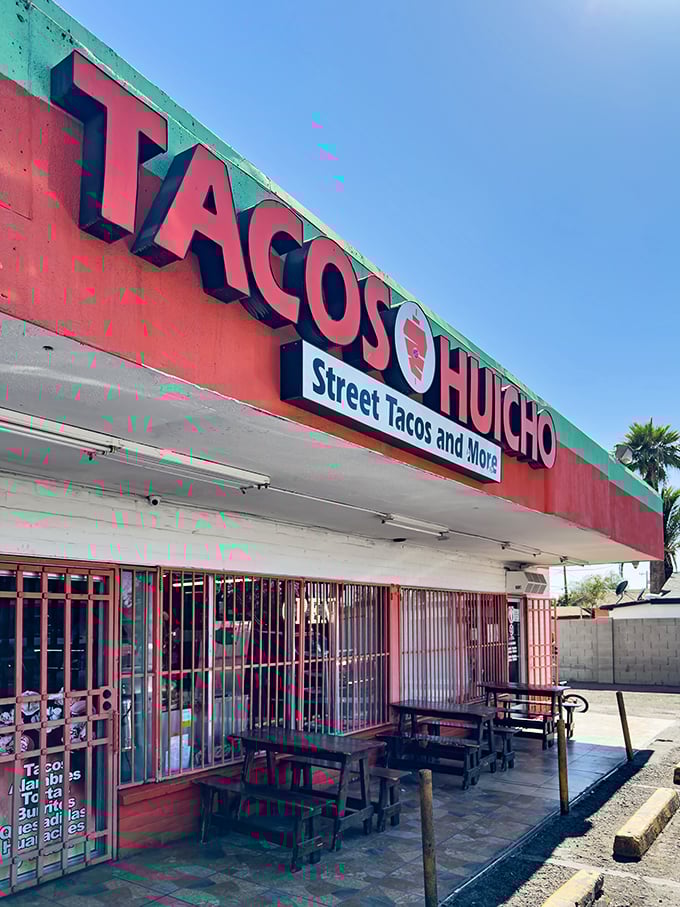 Tacos Huicho's no-nonsense signage cuts right to the chase. No fancy frills needed when your street tacos speak volumes.