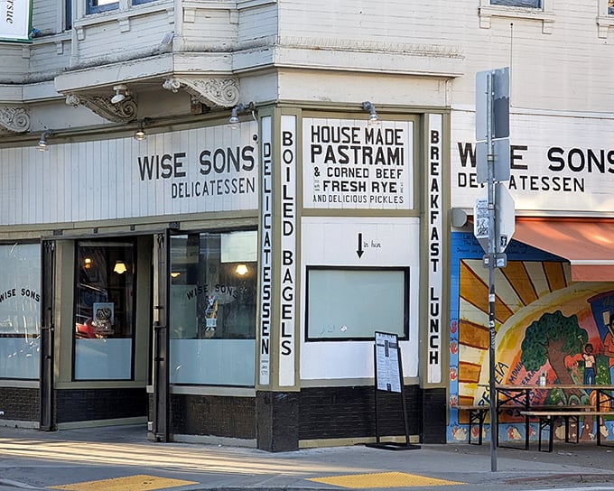 Wise Sons' classic deli façade proudly announces its house-made pastrami, a taste of Jewish tradition in San Francisco.