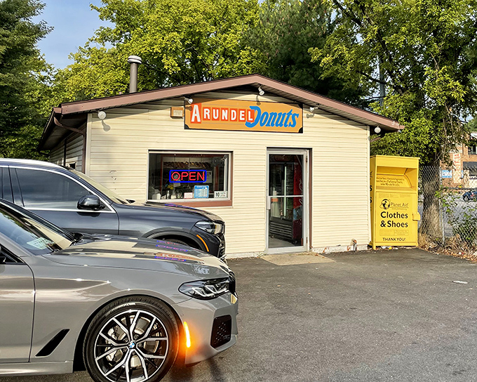 Morning light illuminates Arundel's unassuming shop. Those cars aren't parked there by accident – locals know where the good stuff is!