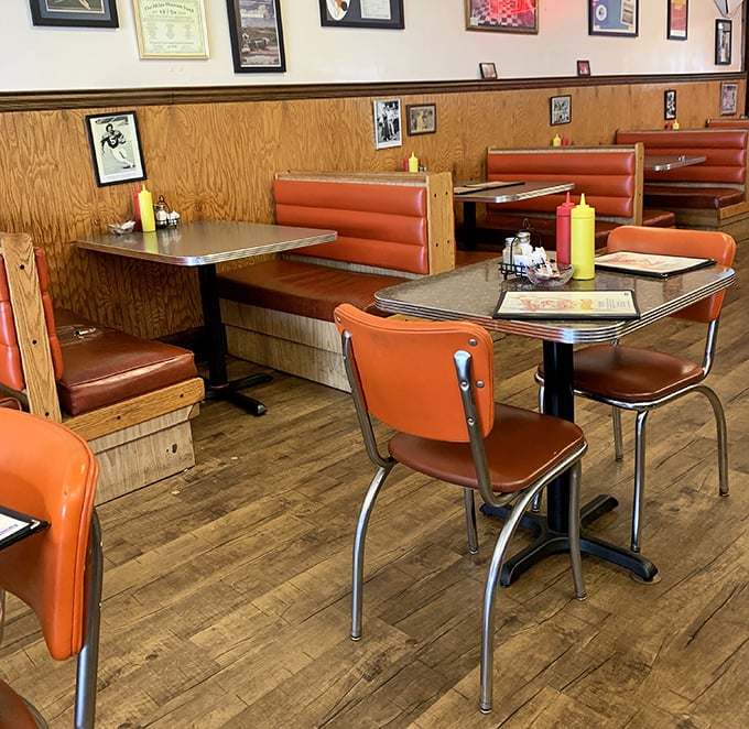 Those orange vinyl booths have cradled generations of hungry locals—each one with a story and an opinion about the perfect eggs.