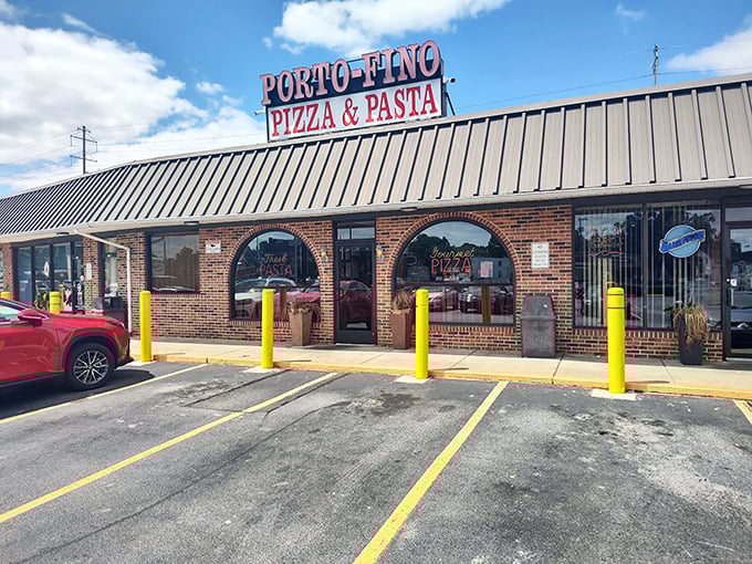 No-nonsense exterior, all-business parking lot—Porto-Fino lets its legendary pizza do all the talking.