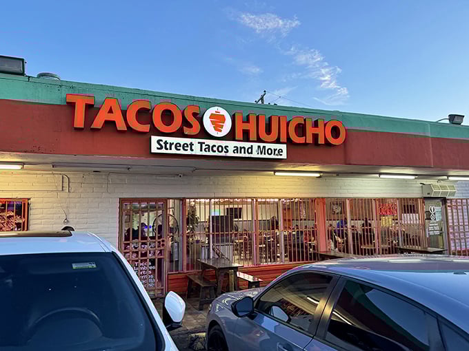 Evening at Tacos Huicho means serious taco business is happening. Those red security gates hide treasures worth seeking out.