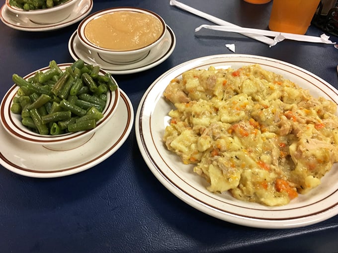 A plate that tells the story of Pennsylvania Dutch cooking—tender chicken and dumplings swimming in gravy that could make a vegetarian reconsider.