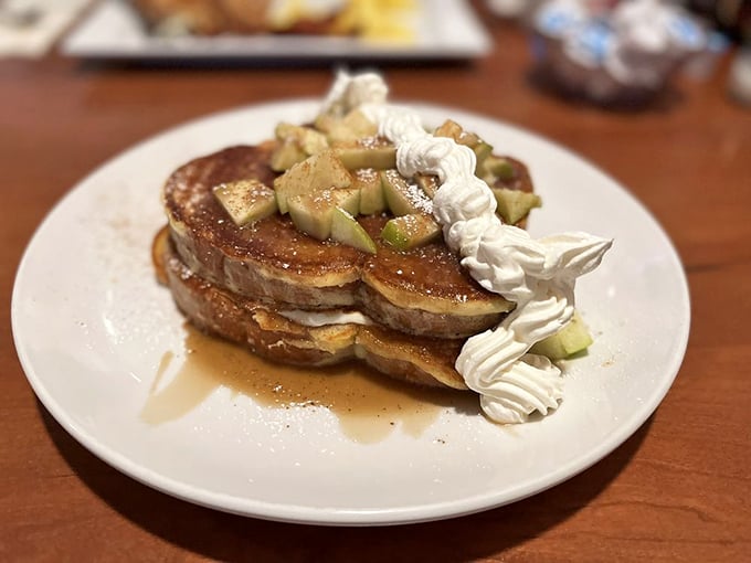 French toast architecture at its finest—layers of bread, caramel, and apple create the breakfast equivalent of winning the lottery.