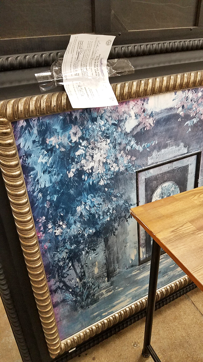 Ornate frame, dreamy landscape—instant sophistication for any wall. Someone's grandmother probably fought to keep this out of the donation pile.