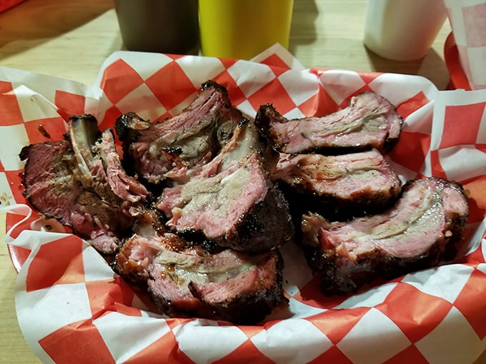 These ribs have the kind of smoke ring that would make a pitmaster weep with joy. The pink halo isn't just color—it's a certificate of authenticity.