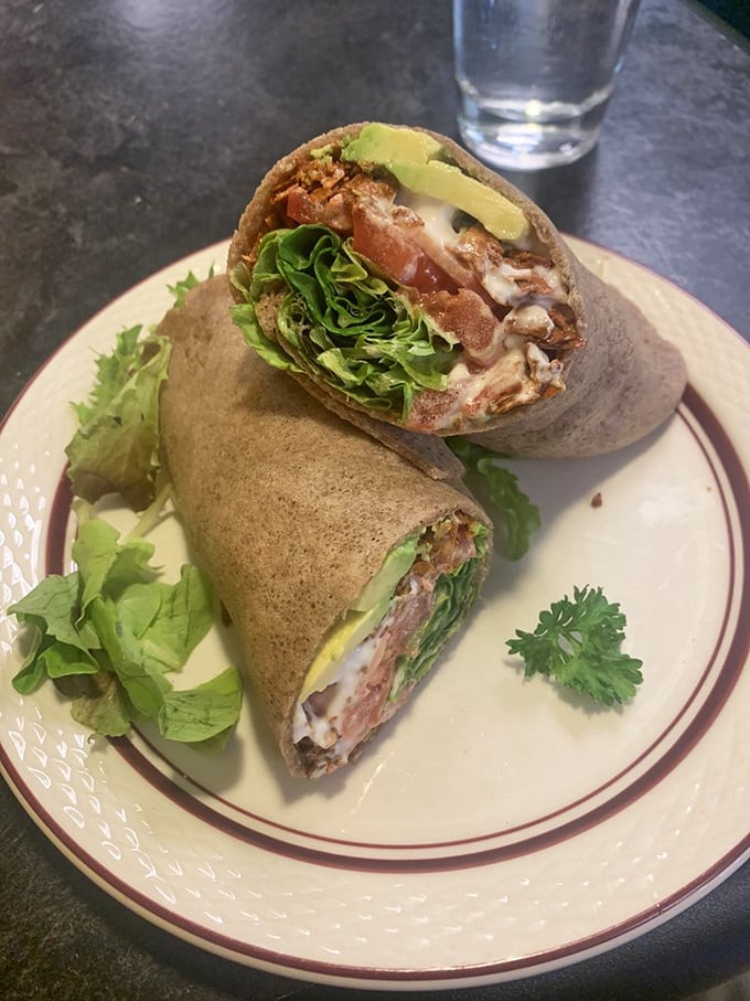 Who needs conventional BLTs when coconut bacon exists? This wrap proves plant-based doesn't mean pleasure-free—it's a handheld vacation from the ordinary.