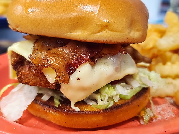This isn't just a bacon cheeseburger—it's architecture. Notice how the melted cheese creates that perfect structural support system.
