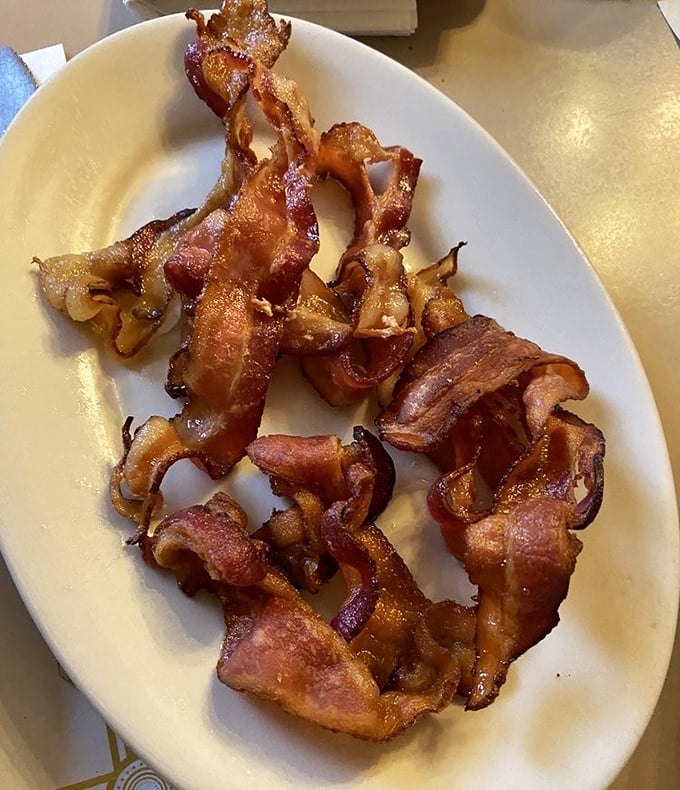 This isn't just bacon; it's a masterclass in pork preparation. Crispy yet still substantial, it's the bacon equivalent of finding the perfect pair of jeans.