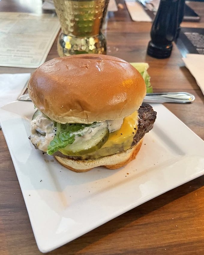 This isn't just a burger—it's edible architecture. Note how the melted cheese creates that perfect seal between beef and bun.